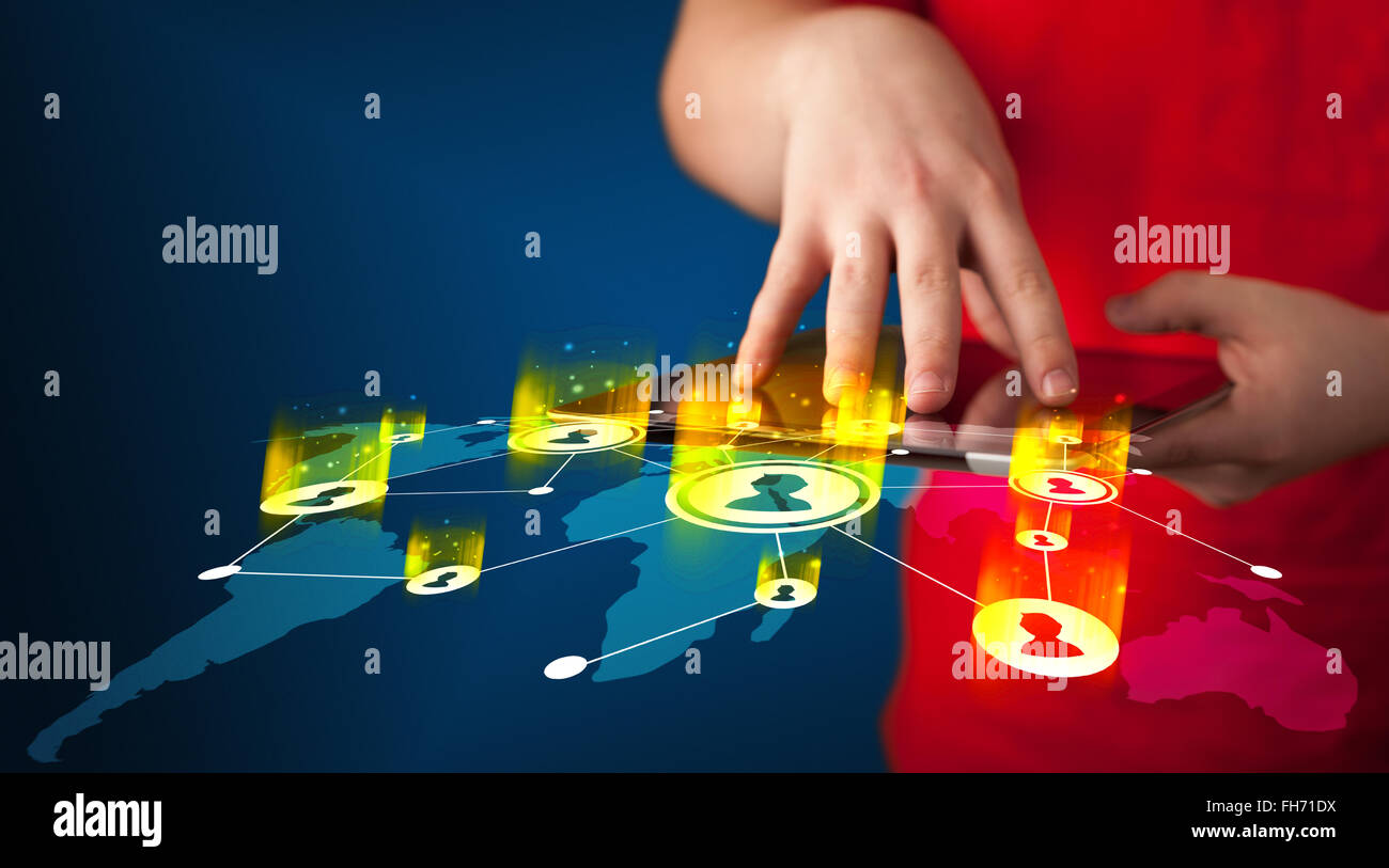 Hand holding tablet device with social network map Stock Photo - Alamy