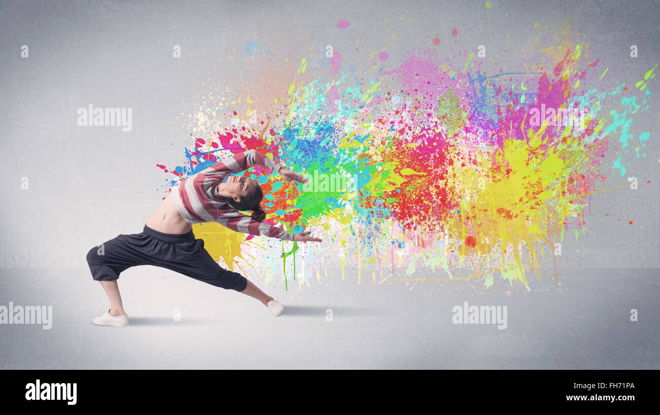 Young colorful street dancer with paint splash Stock Photo - Alamy