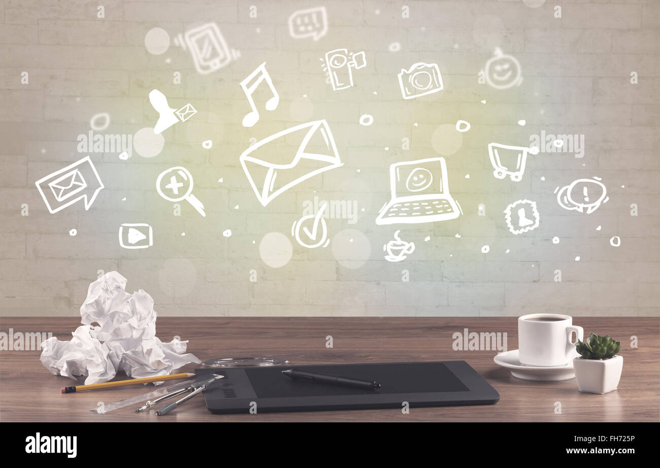 Office desk with communication icons Stock Photo - Alamy