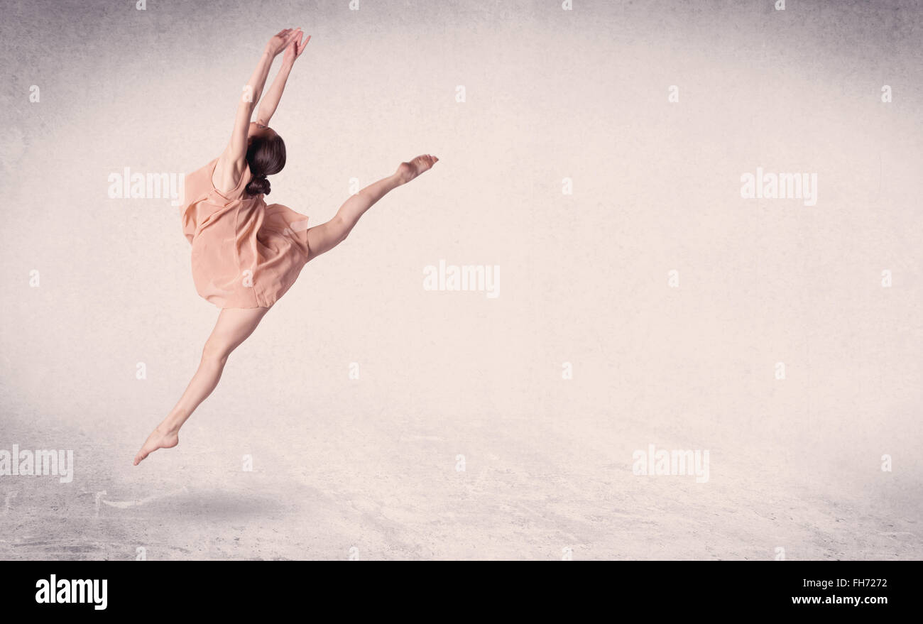 Modern ballet dancer performing art jump with empty background Stock ...