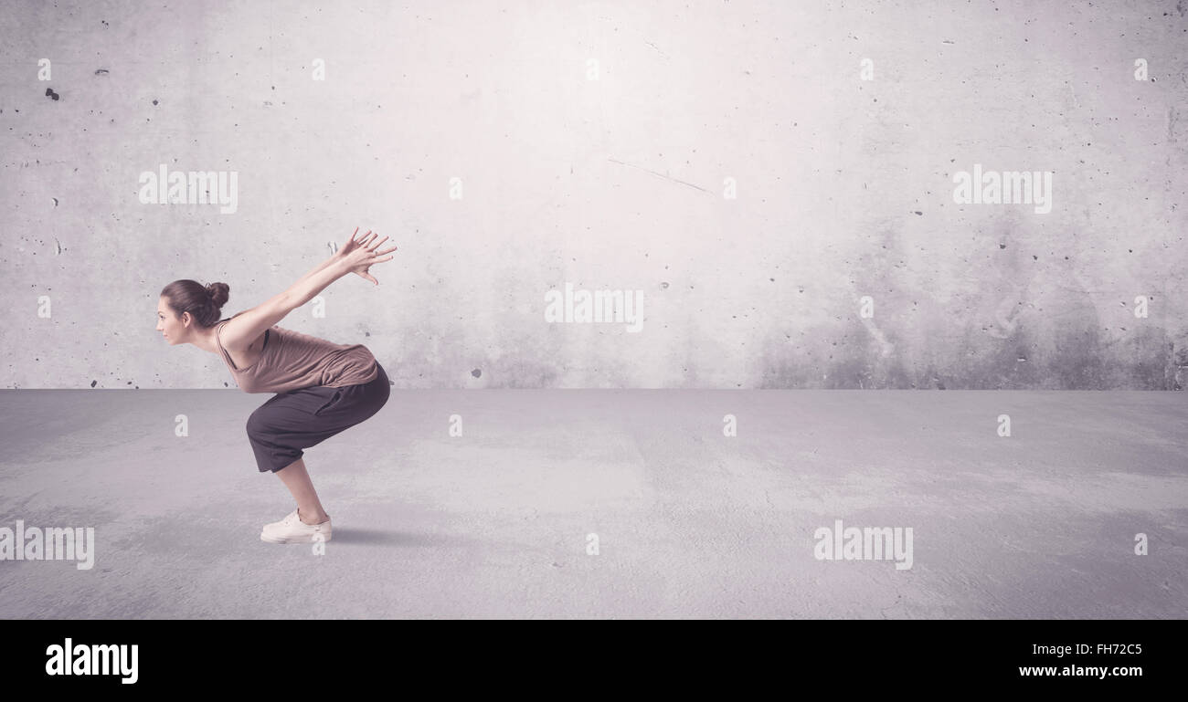 Pretty urban dancer with empty background Stock Photo - Alamy