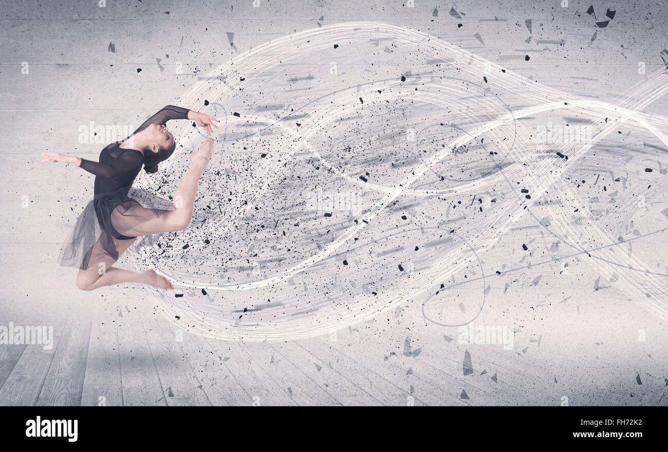 Performance ballet dancer jumping with energy explosion particles Stock ...