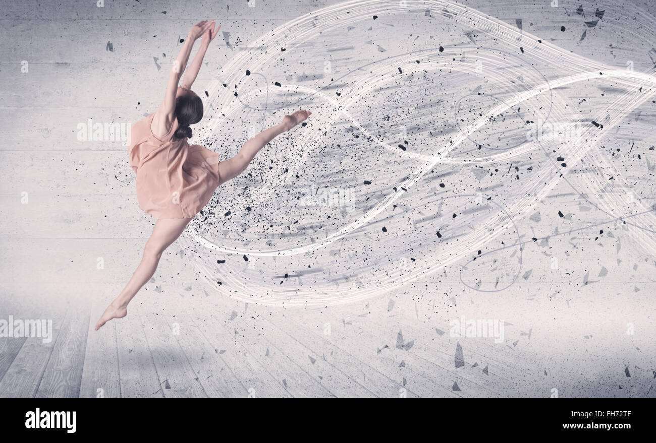 Performance ballet dancer jumping with energy explosion particles Stock ...