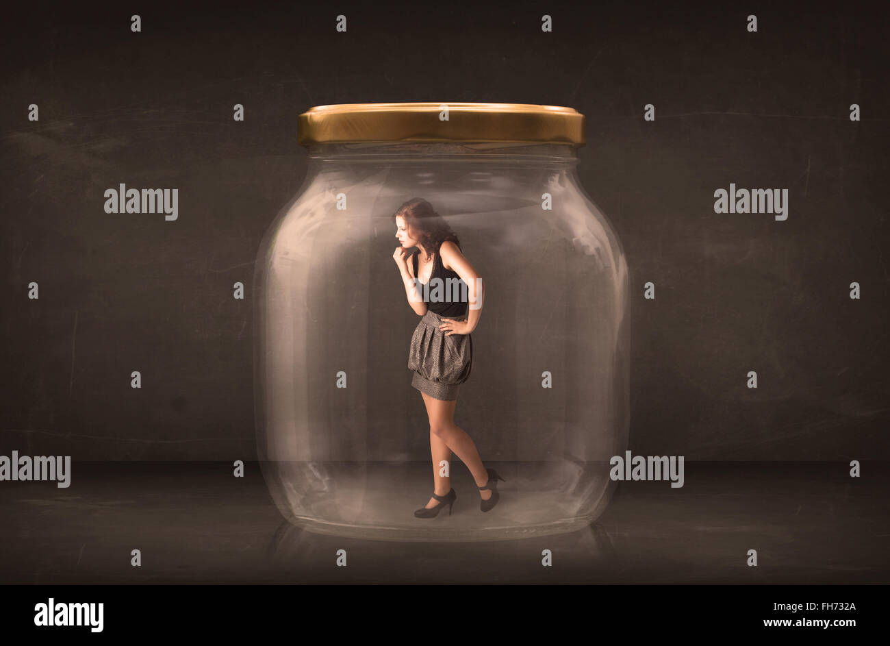People trapped in glass jar hi-res stock photography and images - Alamy