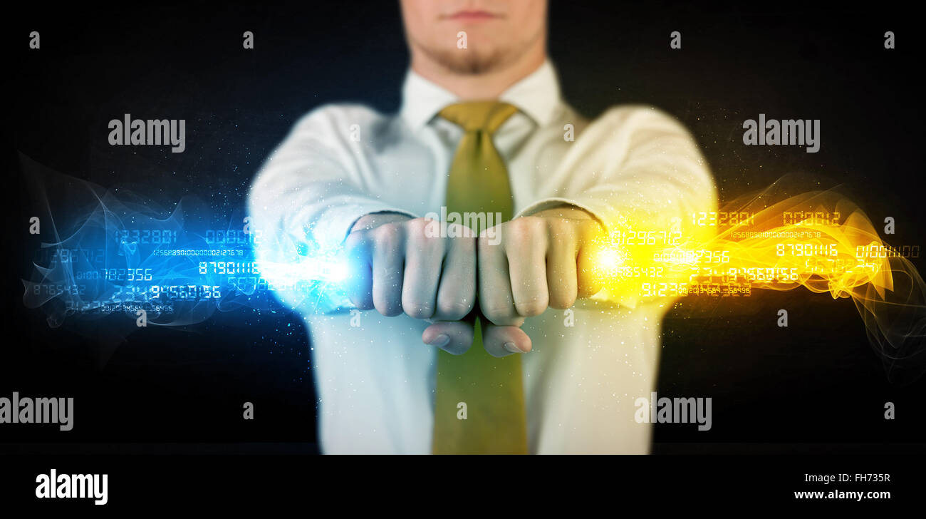 Man holding colorful glowing data in his hands Stock Photo - Alamy