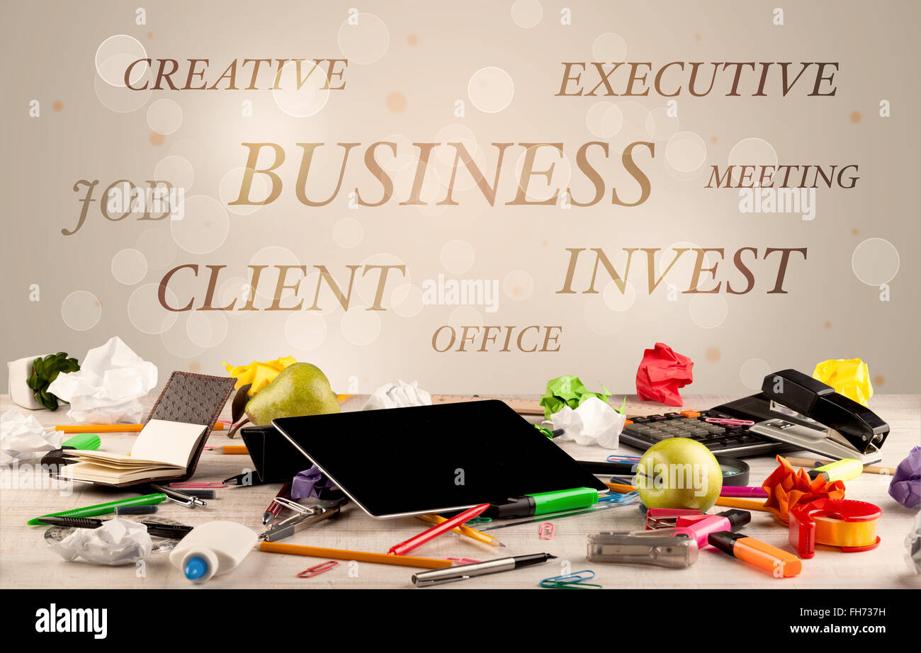 Business office desk with writing on wall Stock Photo - Alamy