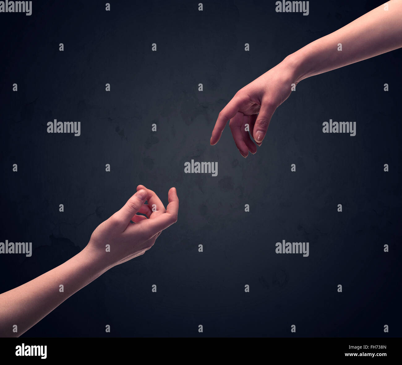 Hand about to touch another one Stock Photo - Alamy