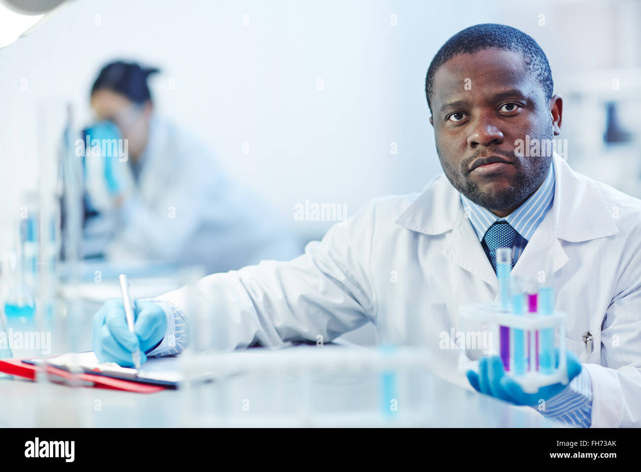 African american lab assistant looking hi-res stock photography and ...