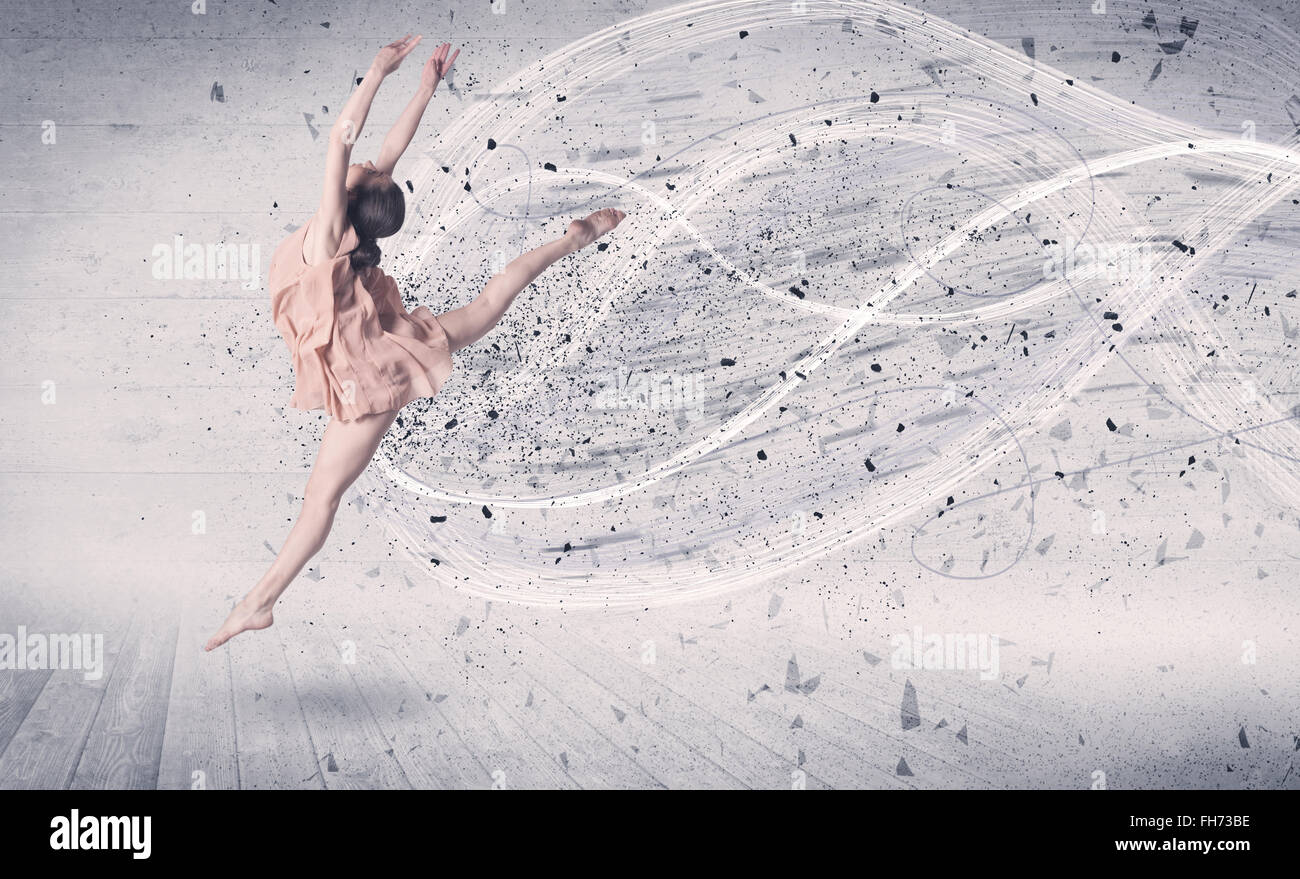 Performance ballet dancer jumping with energy explosion particles Stock ...