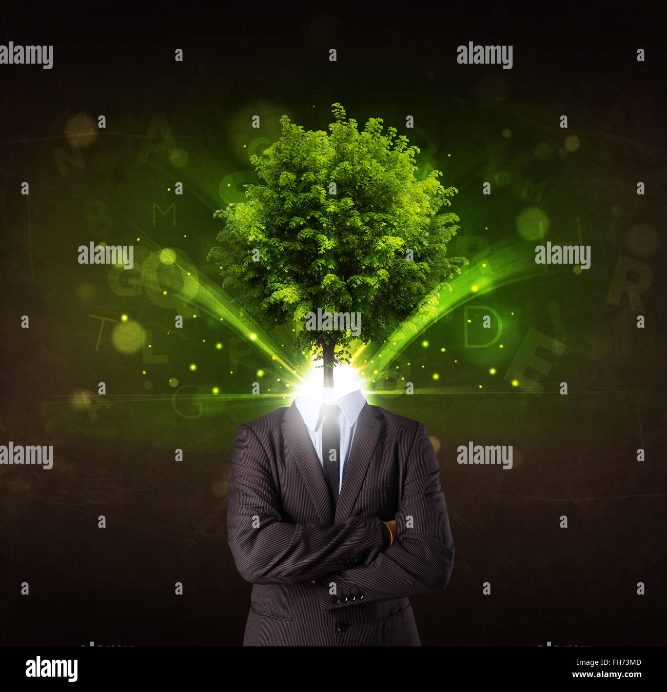 Man with green tree head concept Stock Photo - Alamy
