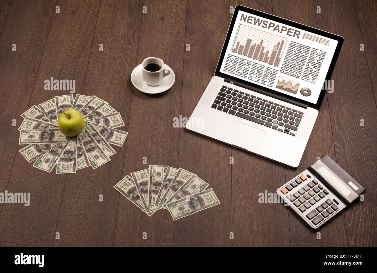 Business laptop with stock market report on wooden desk Stock Photo - Alamy