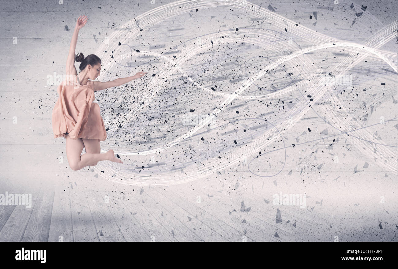 Performance ballet dancer jumping with energy explosion particles Stock ...