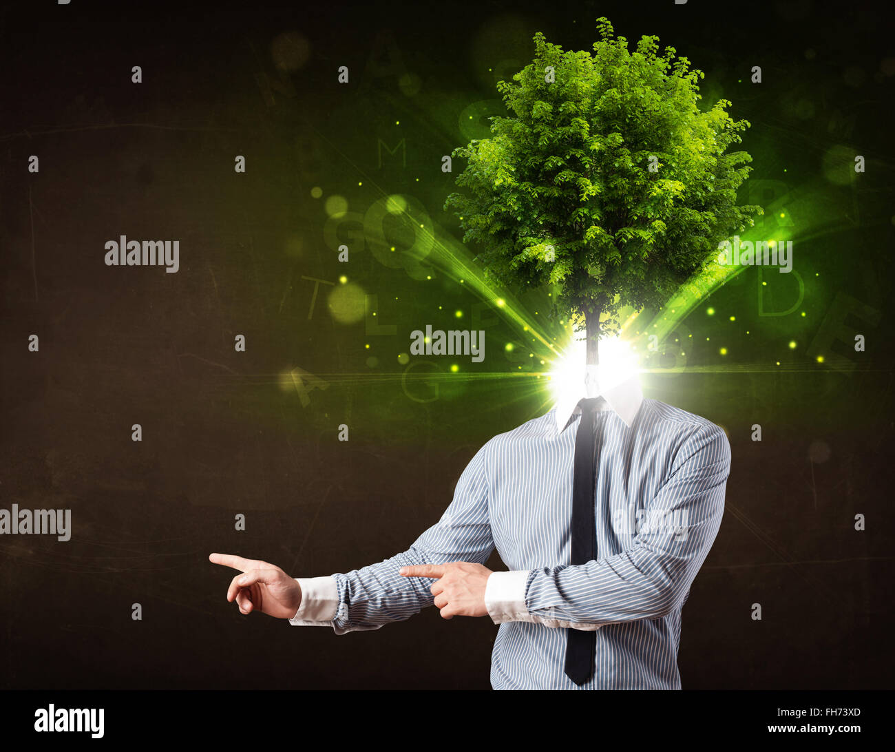 Man with green tree head concept Stock Photo - Alamy