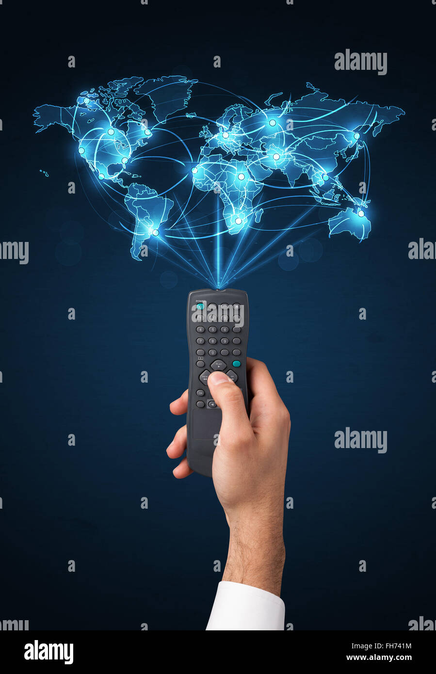 Hand with remote control, social media concept Stock Photo - Alamy