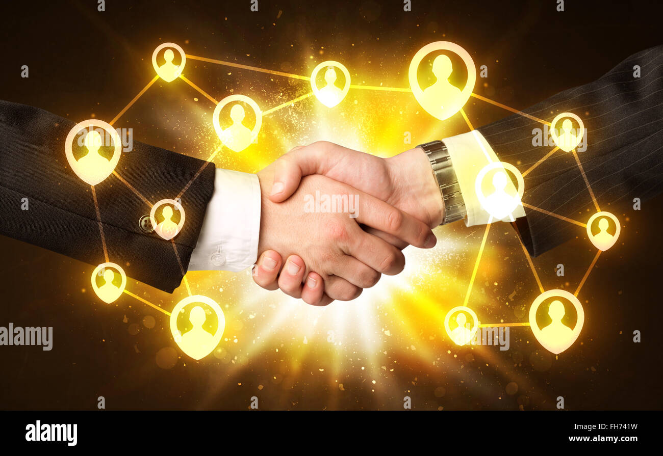 Social netwok connection handshake Stock Photo - Alamy