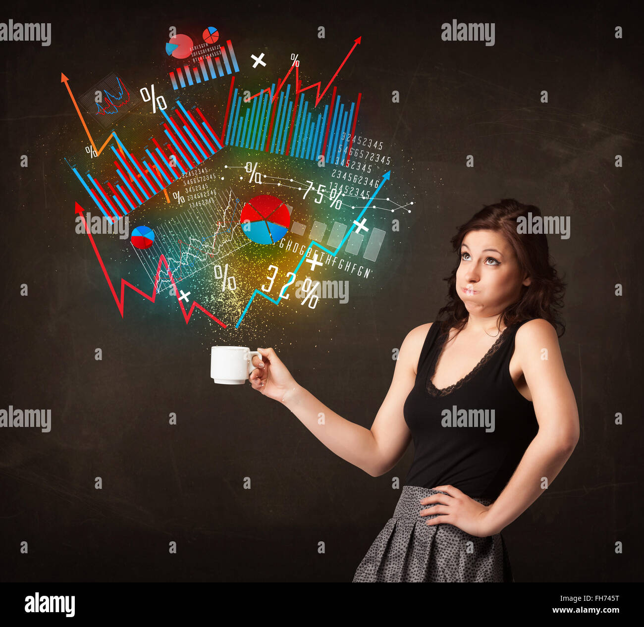 Businesswoman holding a white cup with diagrams and graphs Stock Photo ...
