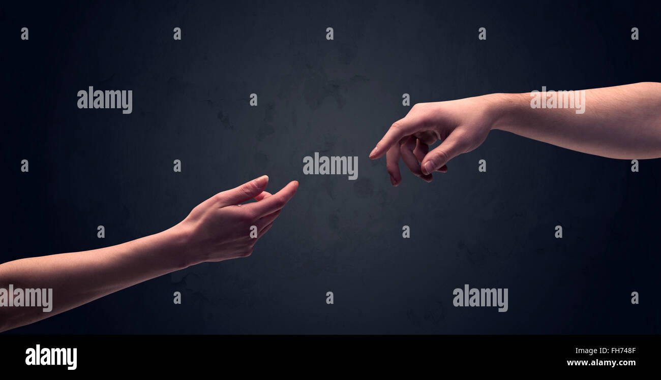 Hand about to touch another one Stock Photo - Alamy