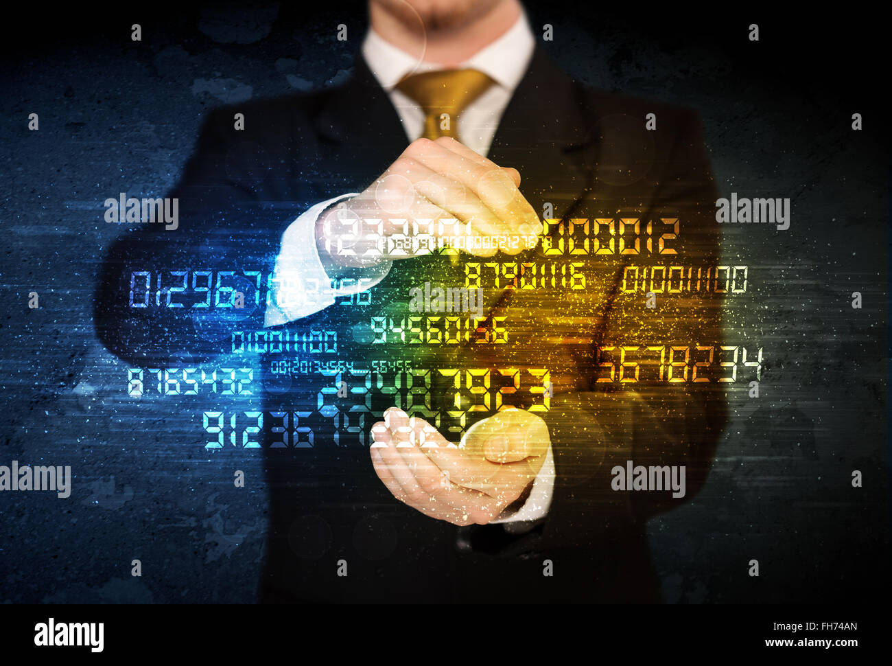 Businessman holding number cloud Stock Photo - Alamy