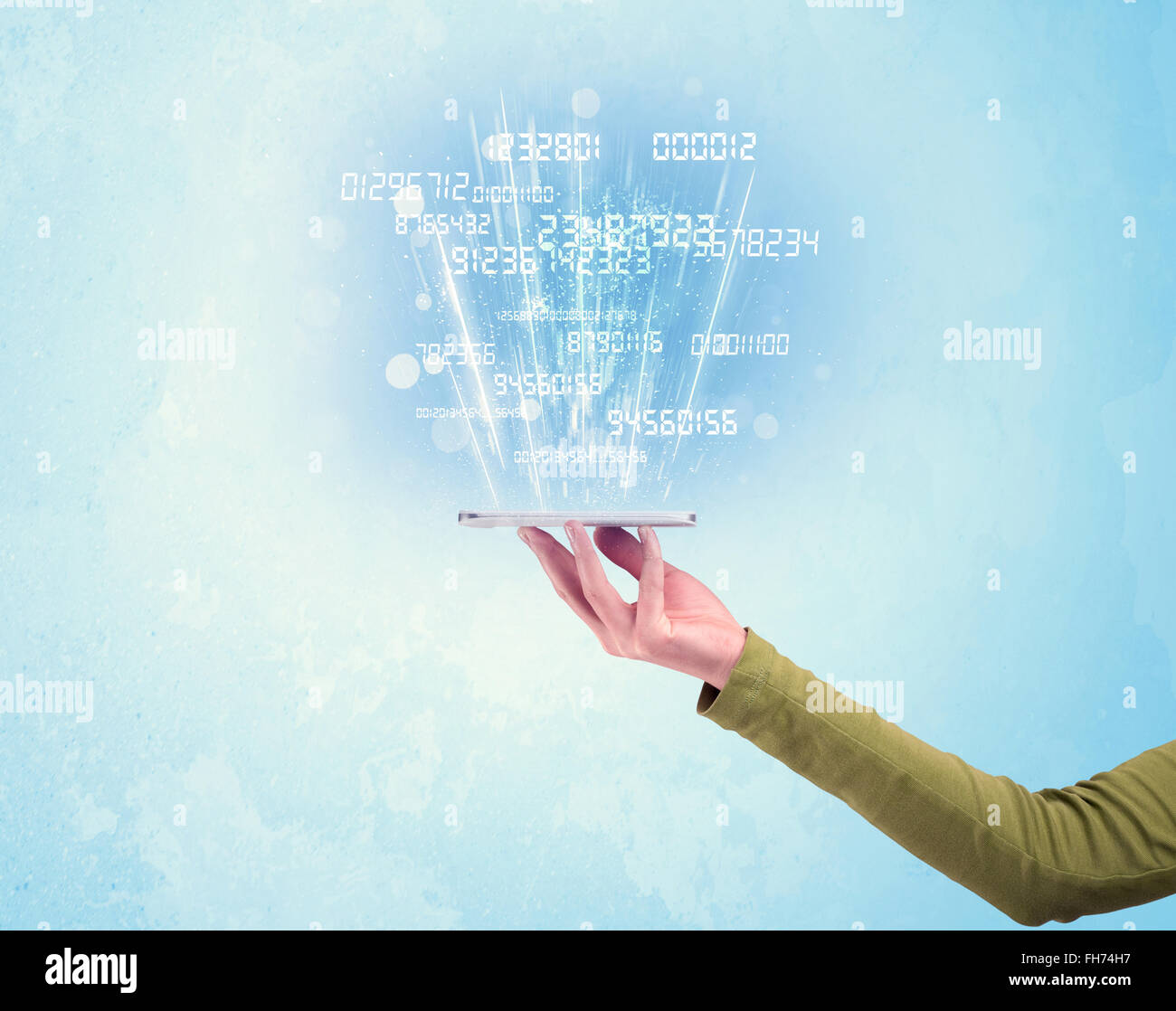Hand holding phone with digital numbers Stock Photo - Alamy