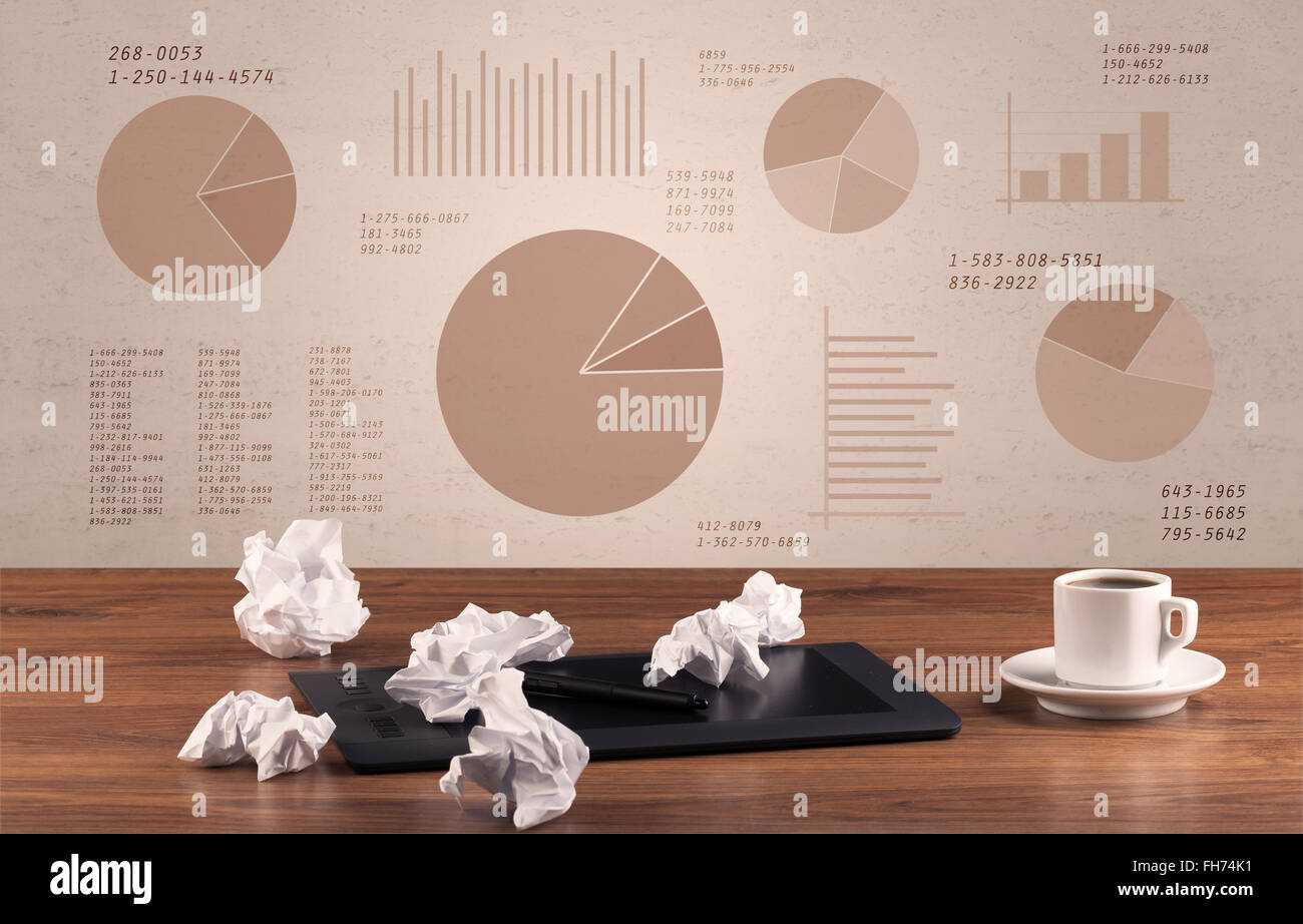 Pie chart graph office desk Stock Photo - Alamy