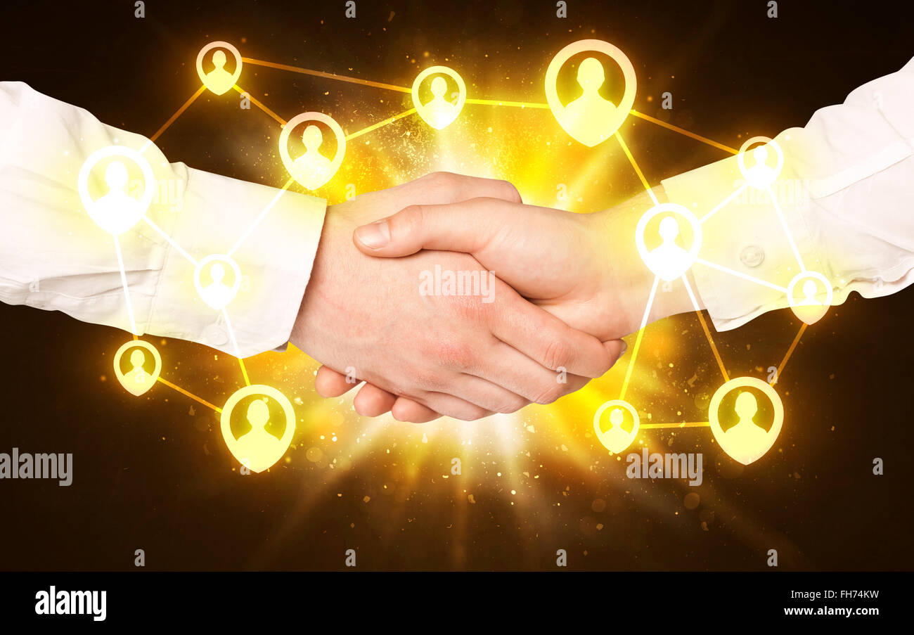 Social netwok connection handshake Stock Photo - Alamy