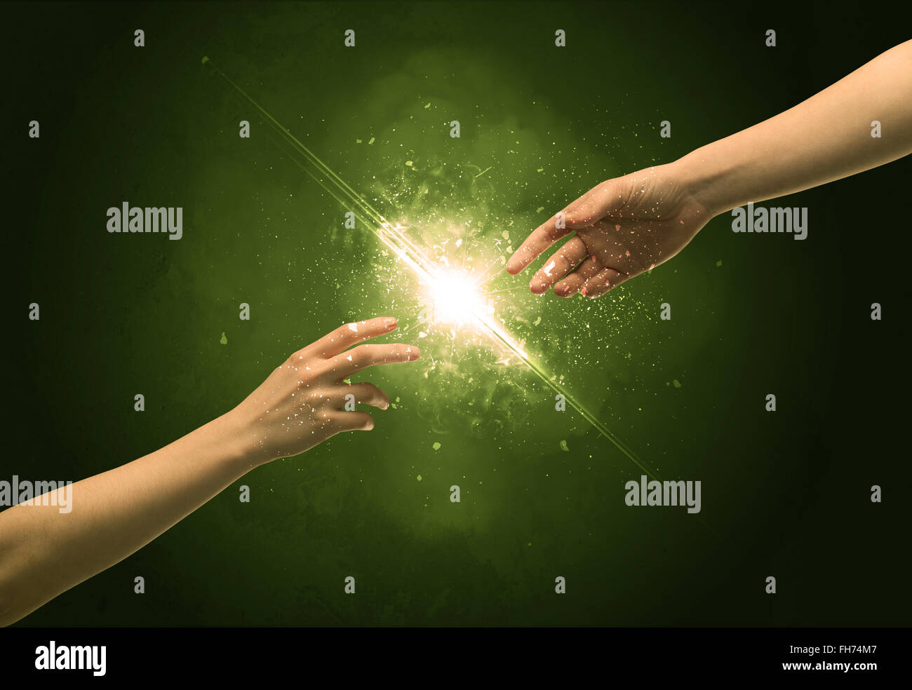 Touching arms lighting spark at fingertip Stock Photo - Alamy