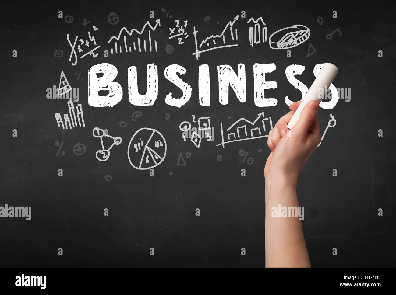 Hand writing business on blackboard Stock Photo - Alamy