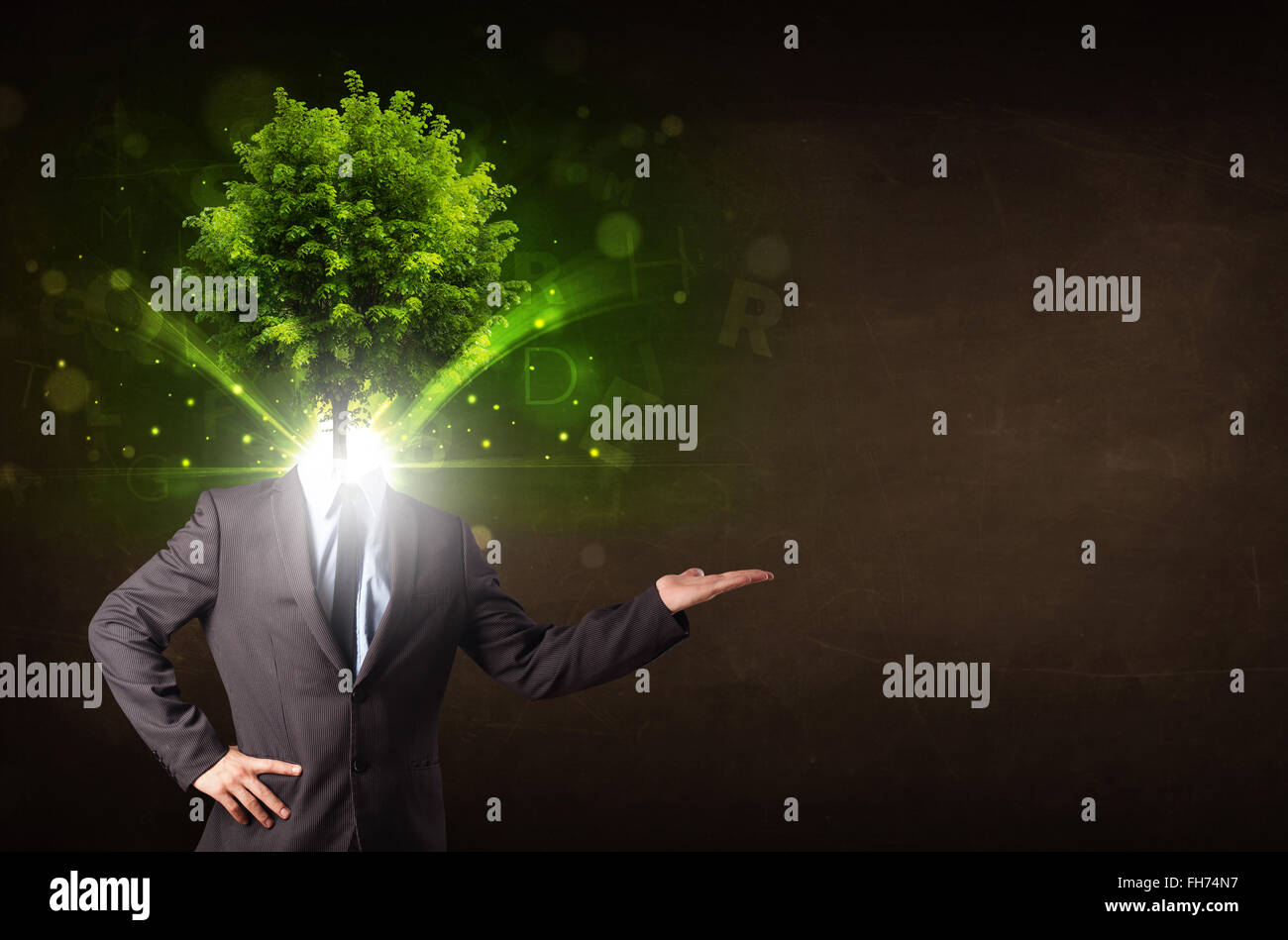 Man with green tree head concept Stock Photo - Alamy