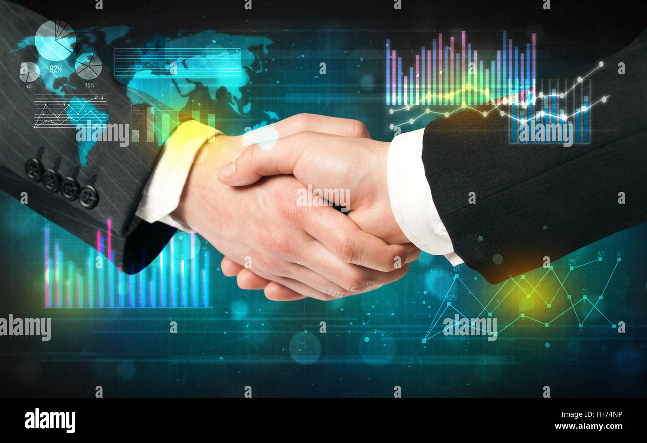 Handshake with diagrams Stock Photo - Alamy