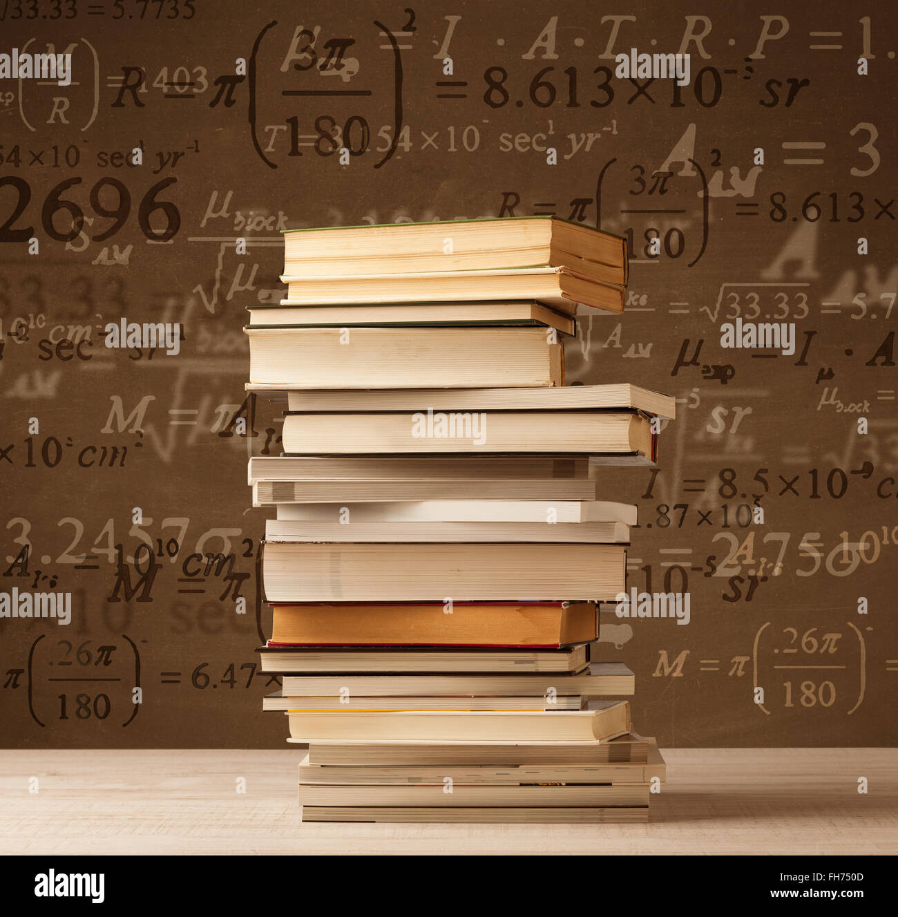 Books on vintage background with math formulas Stock Photo - Alamy
