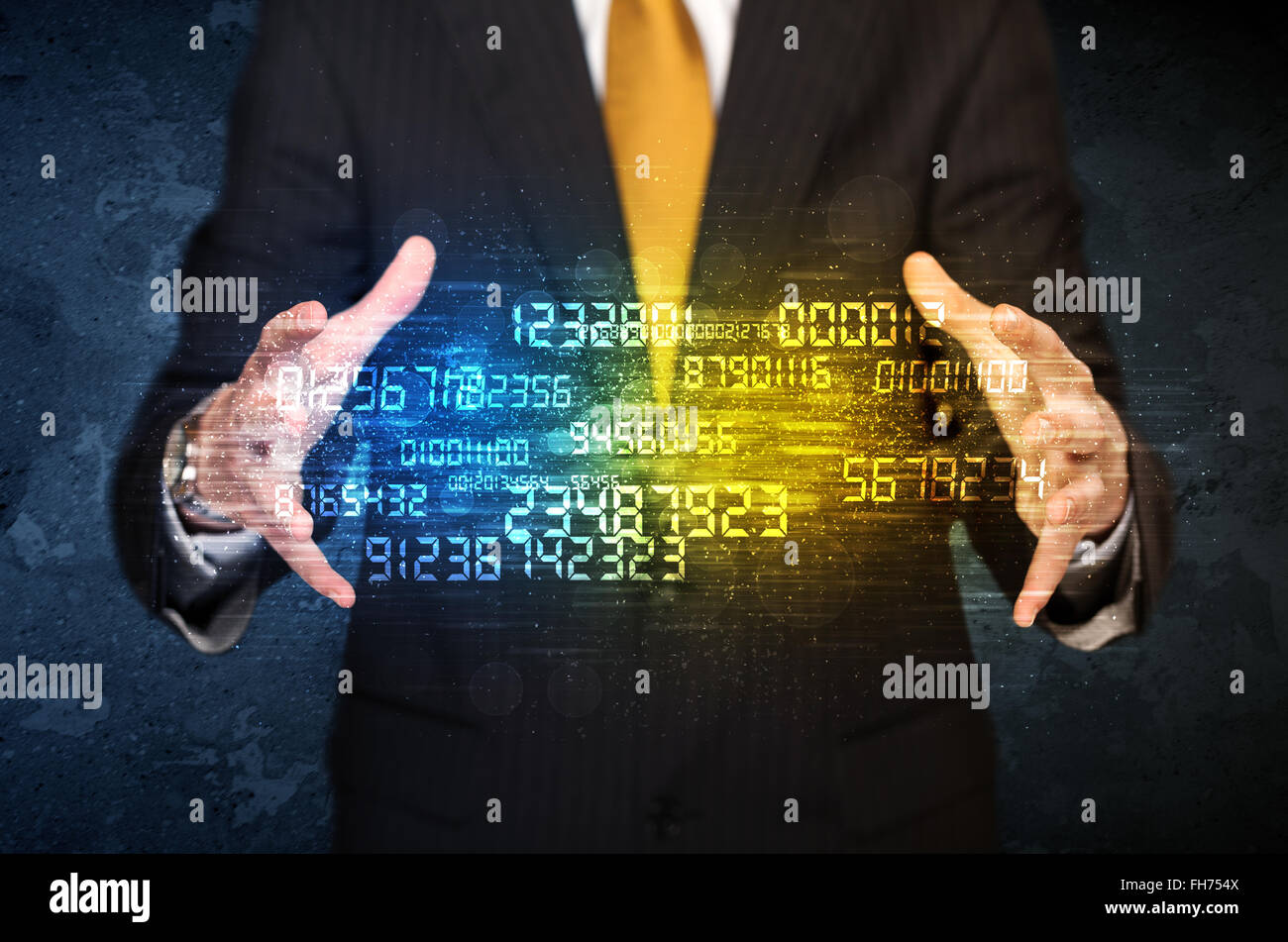 Businessman holding number cloud Stock Photo - Alamy