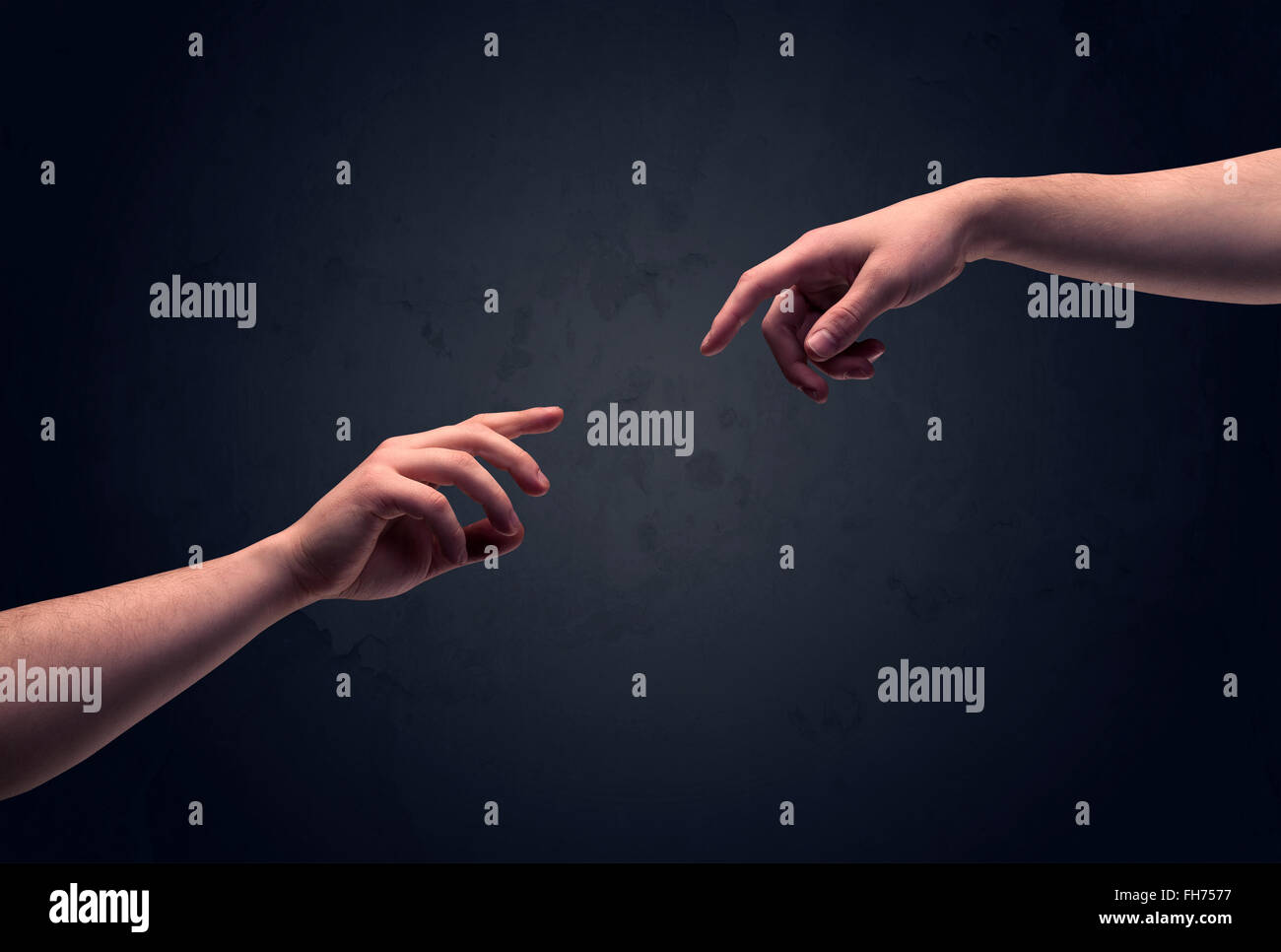 Hand about to touch another one Stock Photo - Alamy