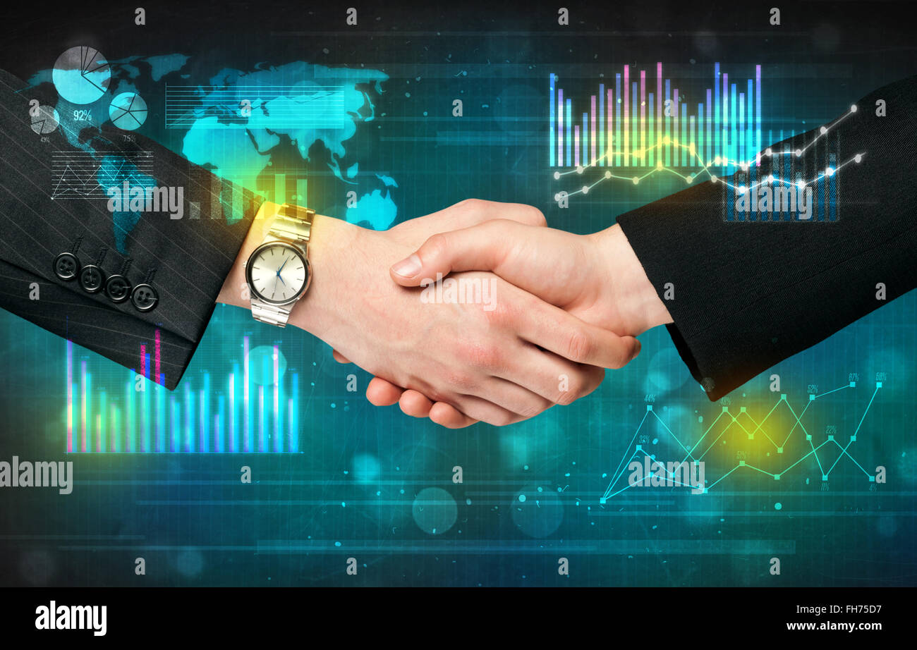 Handshake with diagrams Stock Photo - Alamy