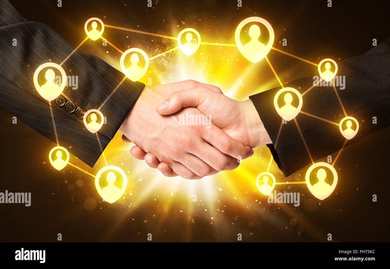 Social netwok connection handshake Stock Photo - Alamy