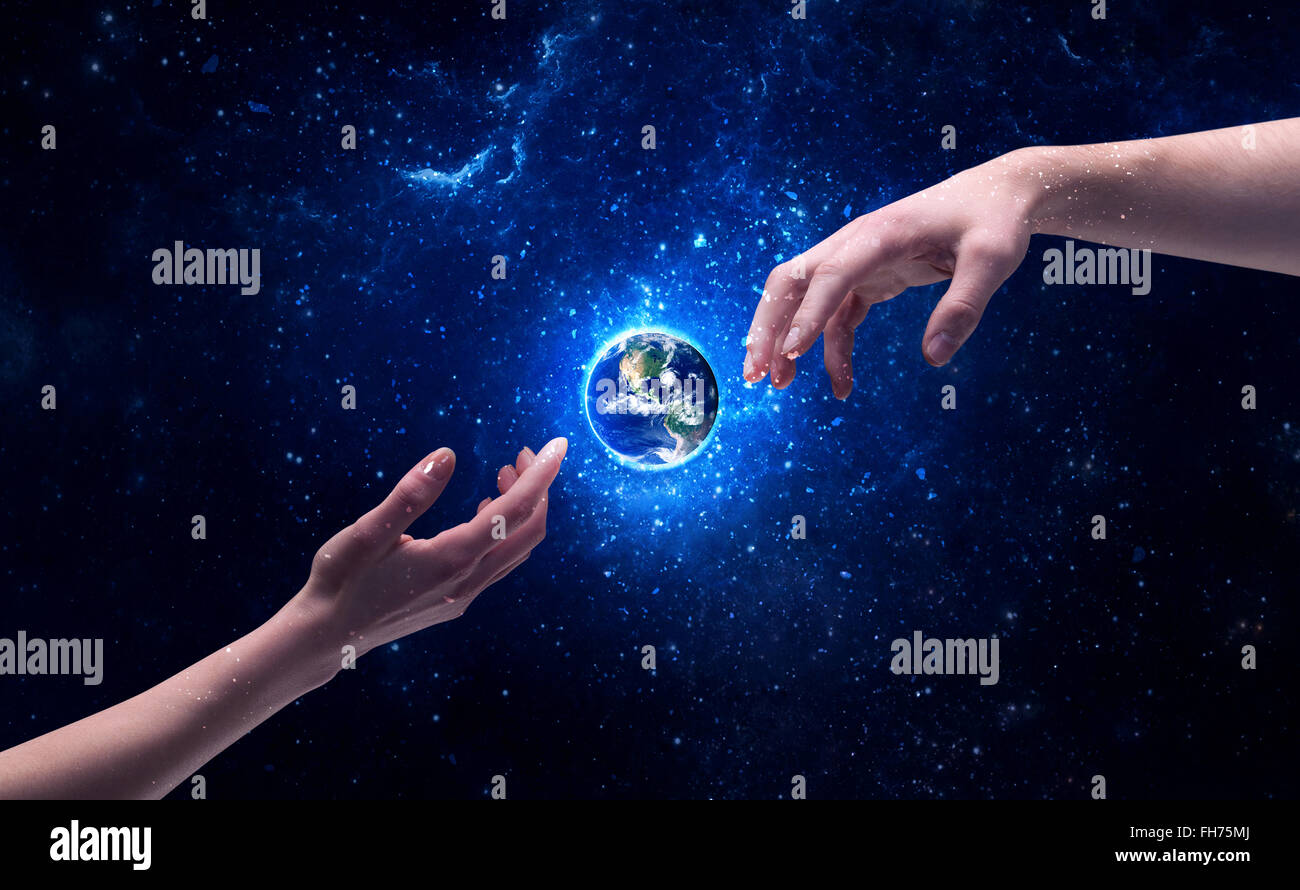 Hands in space touching planet earth Stock Photo - Alamy