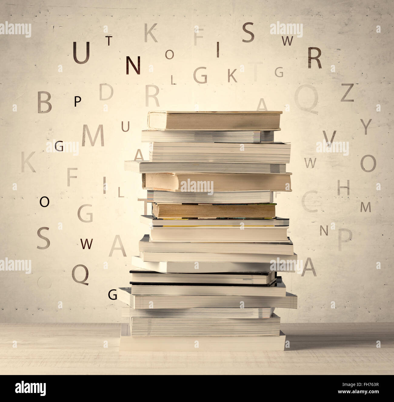 Books with flying letters on vintage background Stock Photo - Alamy