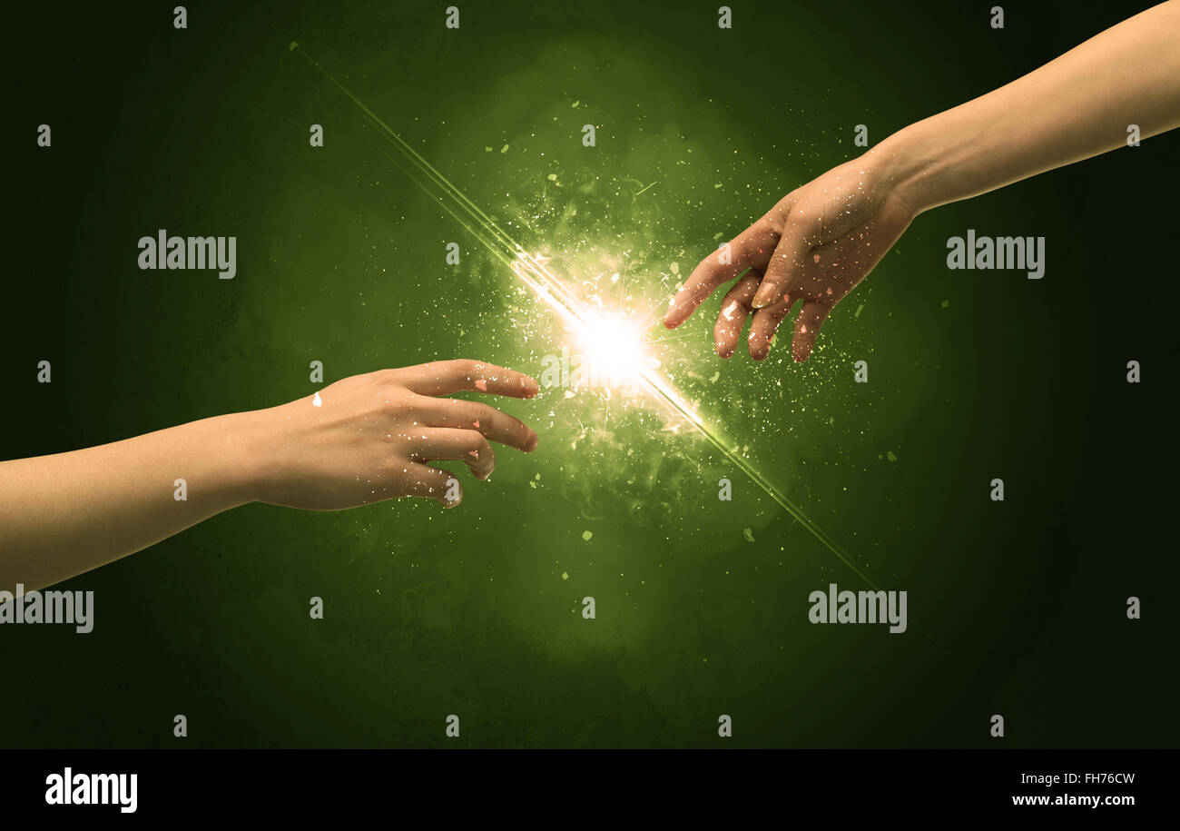 Touching arms lighting spark at fingertip Stock Photo - Alamy