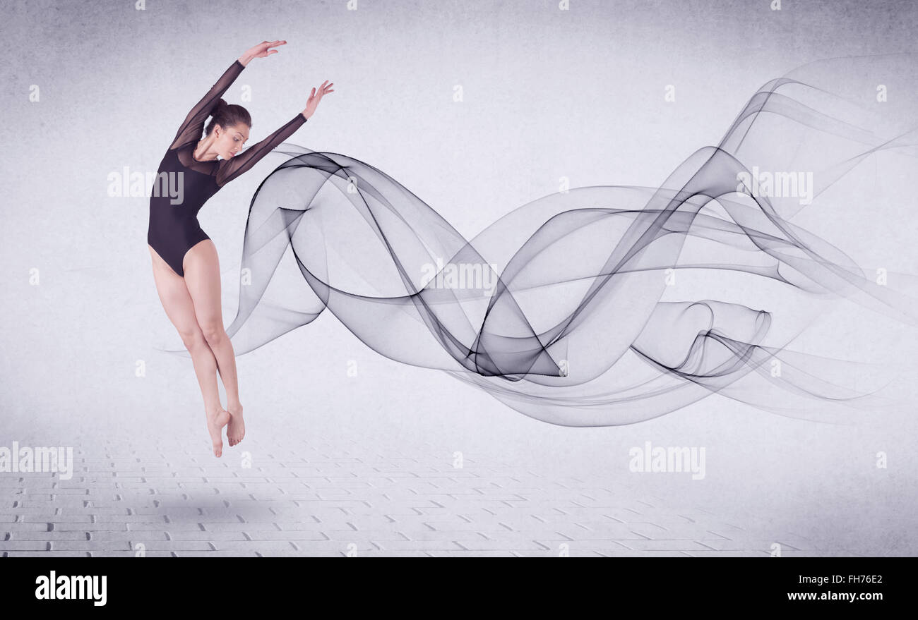 Modern ballet dancer performing with abstract swirl Stock Photo - Alamy