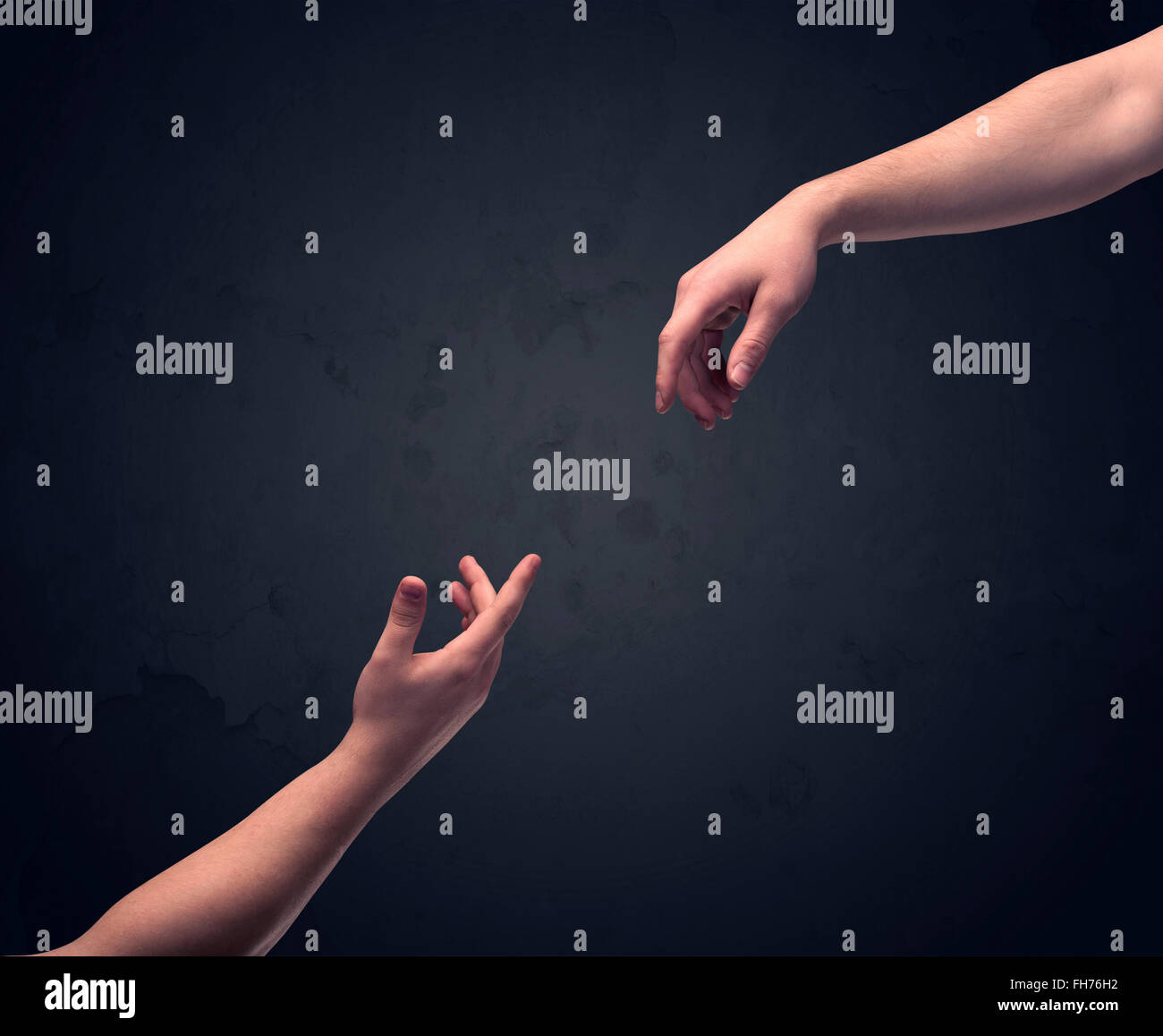 Hand about to touch another one Stock Photo - Alamy