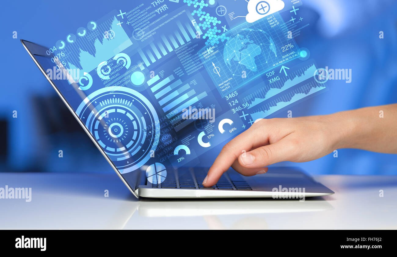 Modern notebook computer with future technology symbols Stock Photo - Alamy