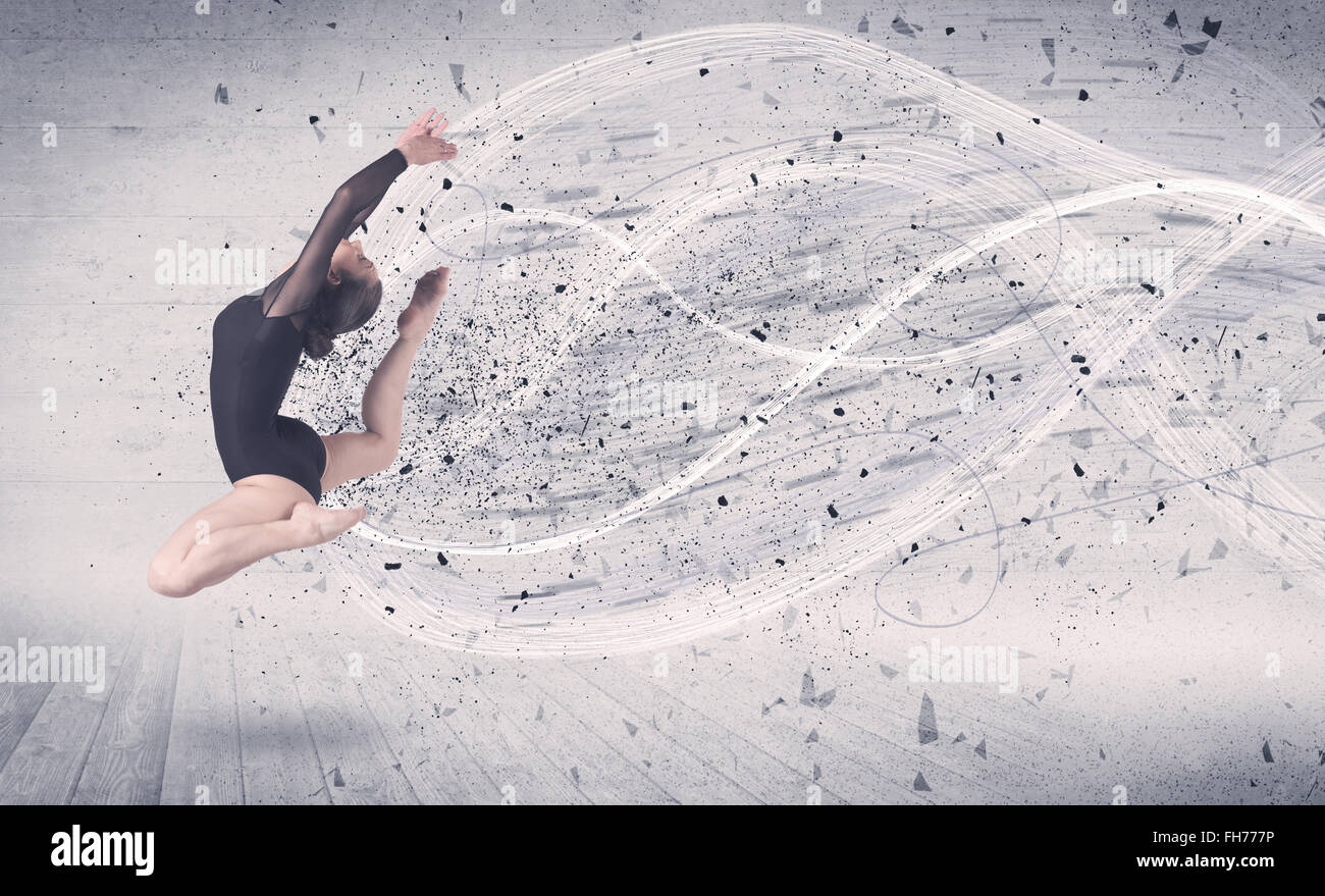 Performance ballet dancer jumping with energy explosion particles Stock ...
