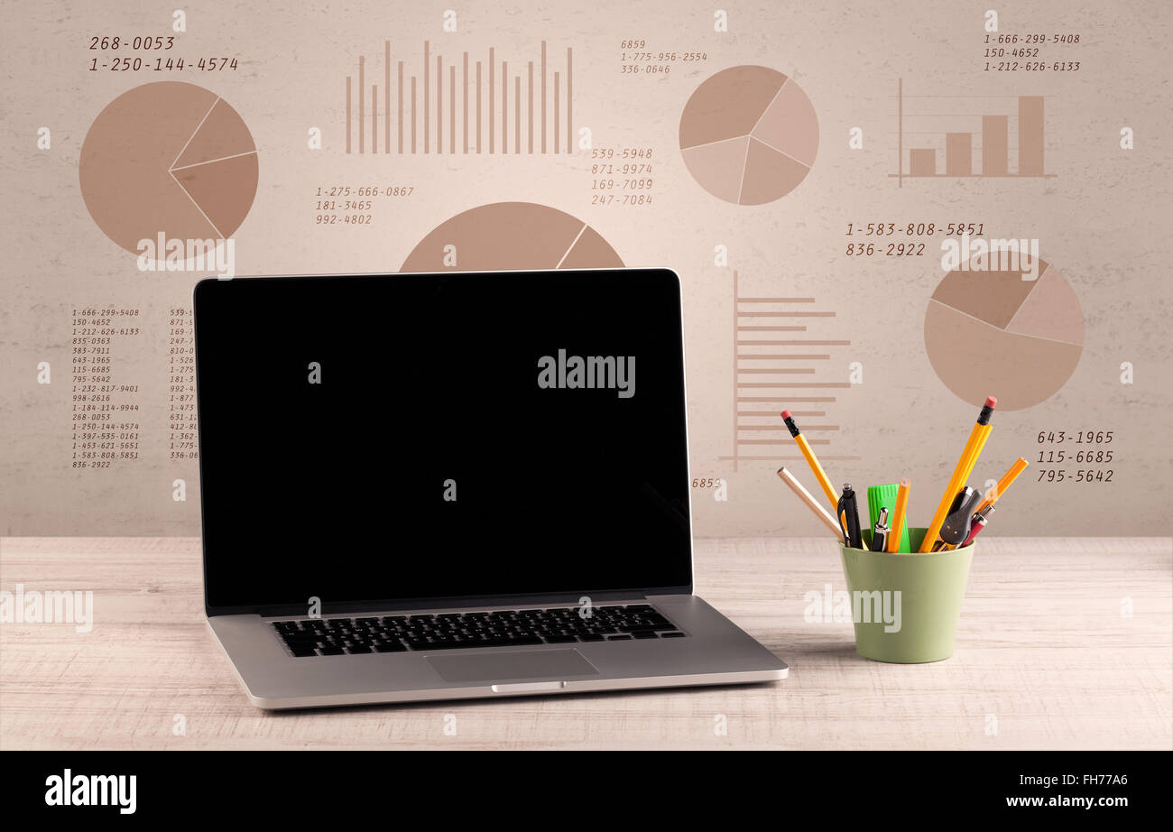 Pie chart graph office desk Stock Photo - Alamy