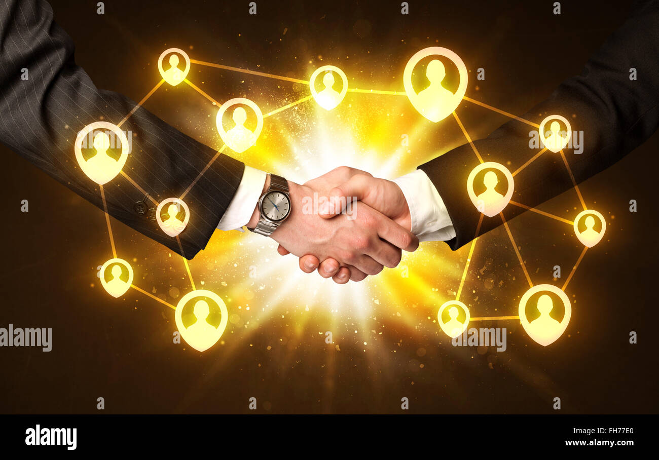 Social netwok connection handshake Stock Photo - Alamy