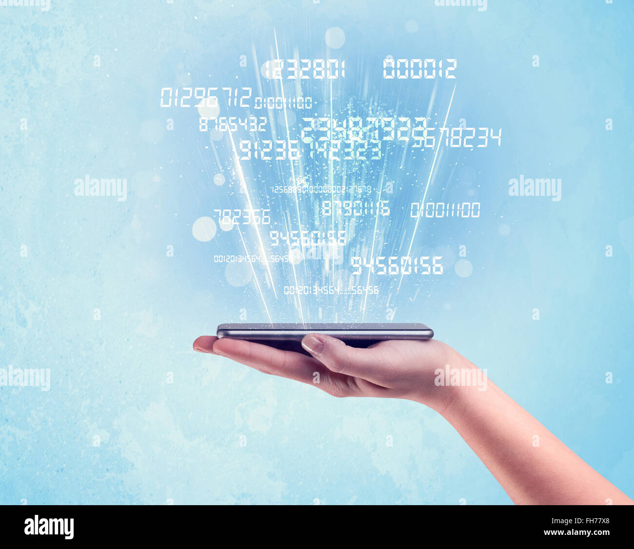 Hand holding phone with digital numbers Stock Photo - Alamy
