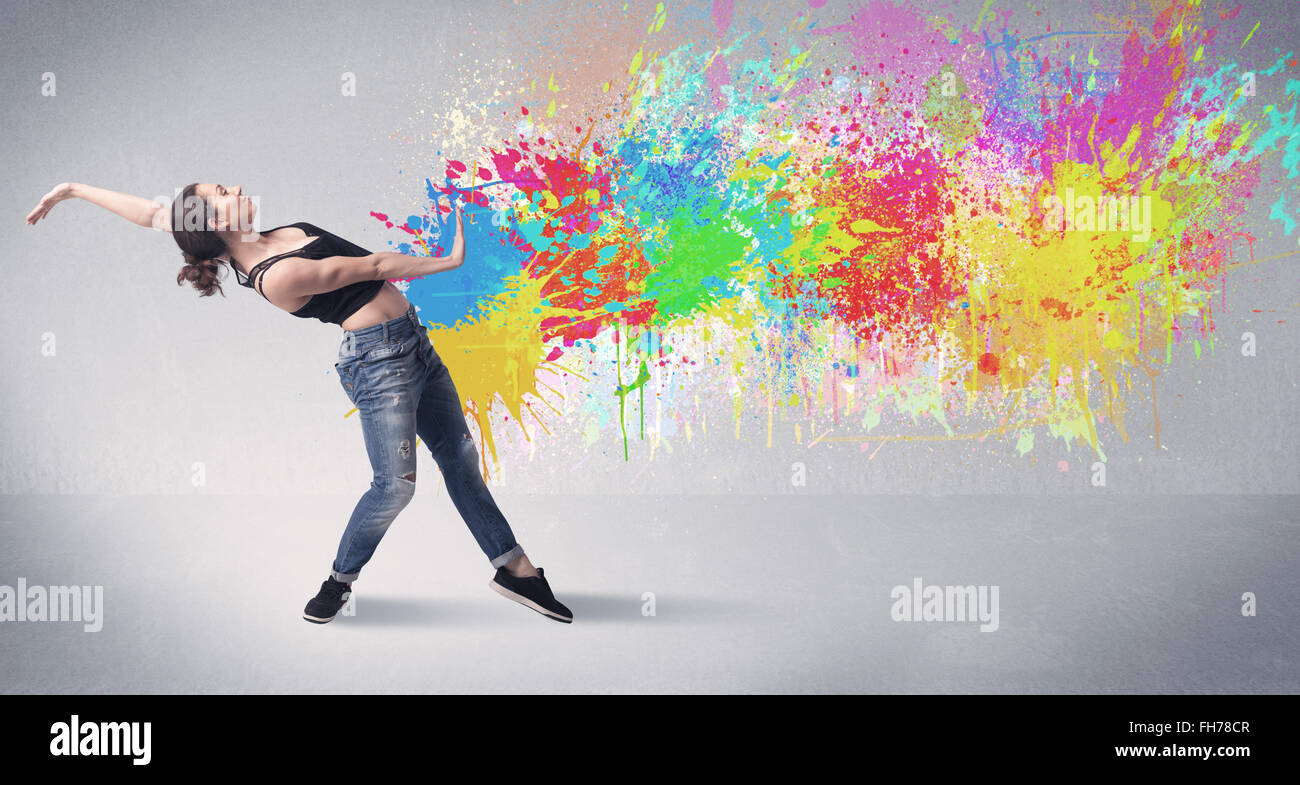 Young colorful street dancer with paint splash Stock Photo - Alamy