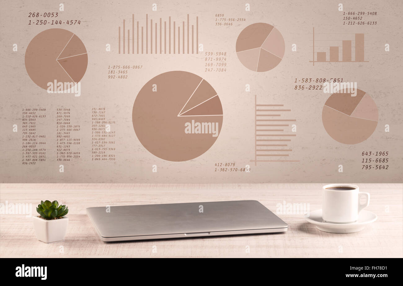 Pie chart graph office desk Stock Photo - Alamy