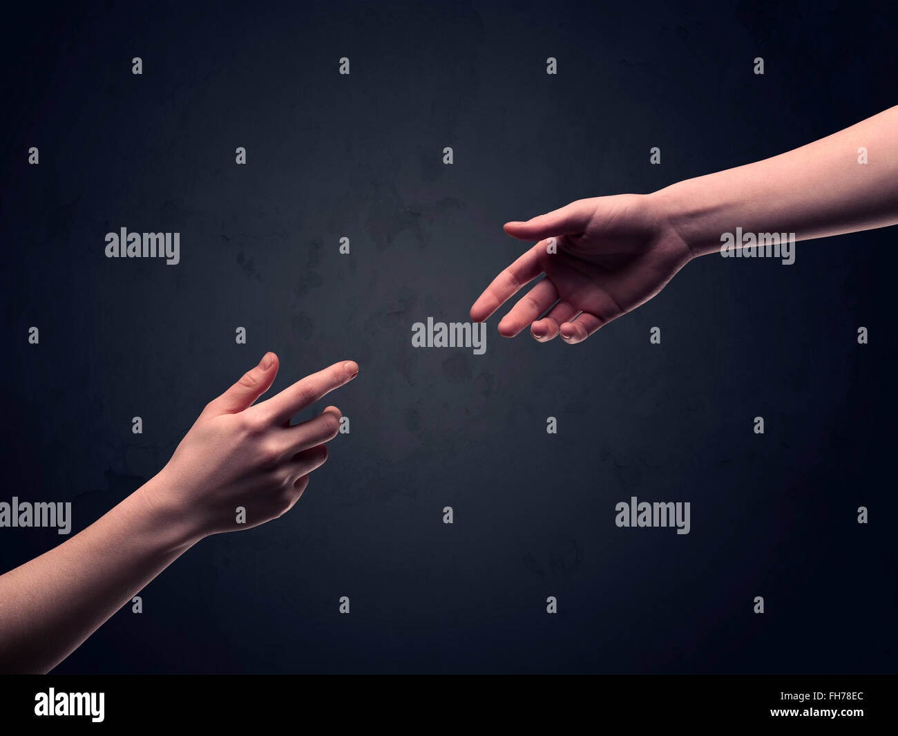 Hand about to touch another one Stock Photo - Alamy