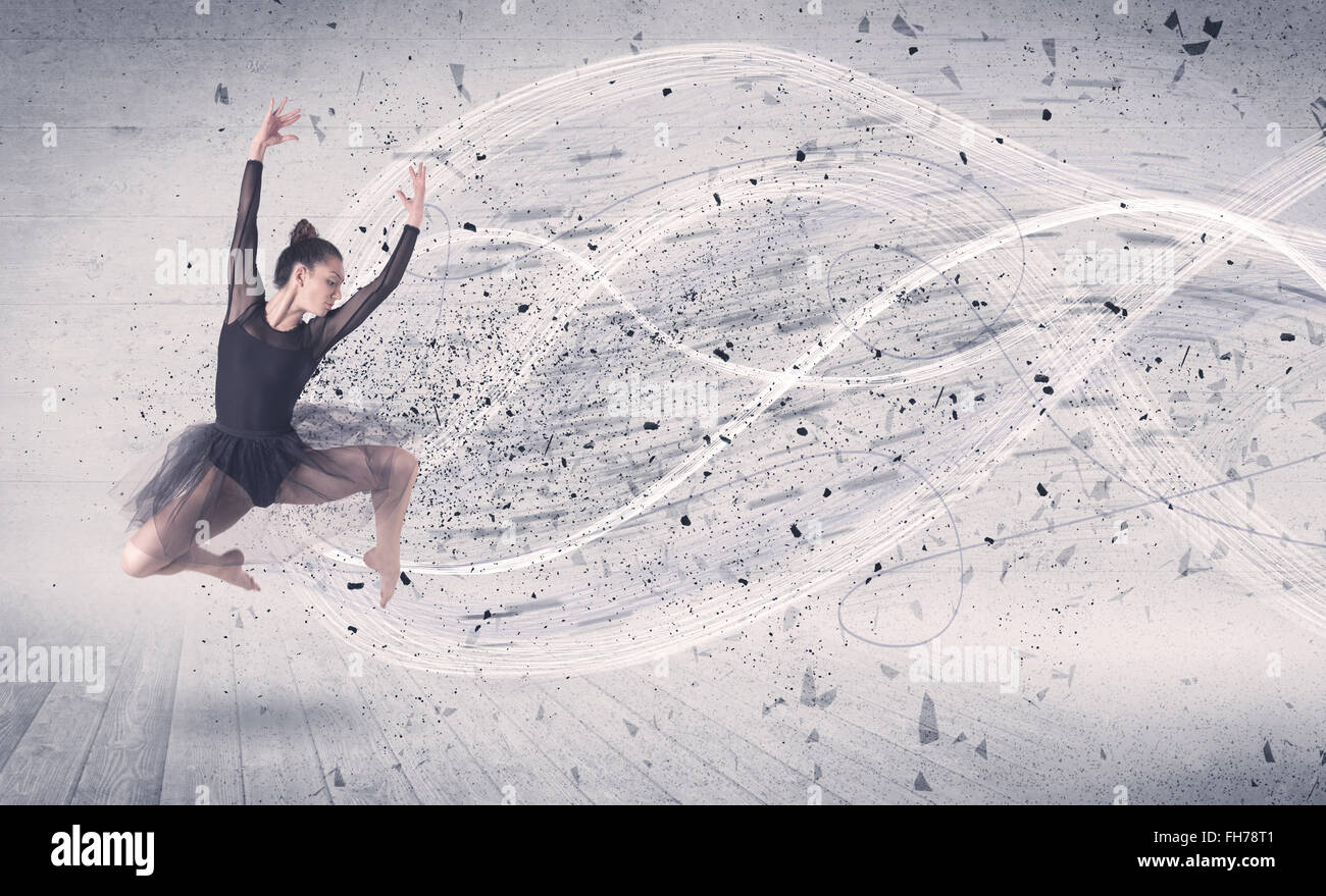 Performance ballet dancer jumping with energy explosion particles Stock ...