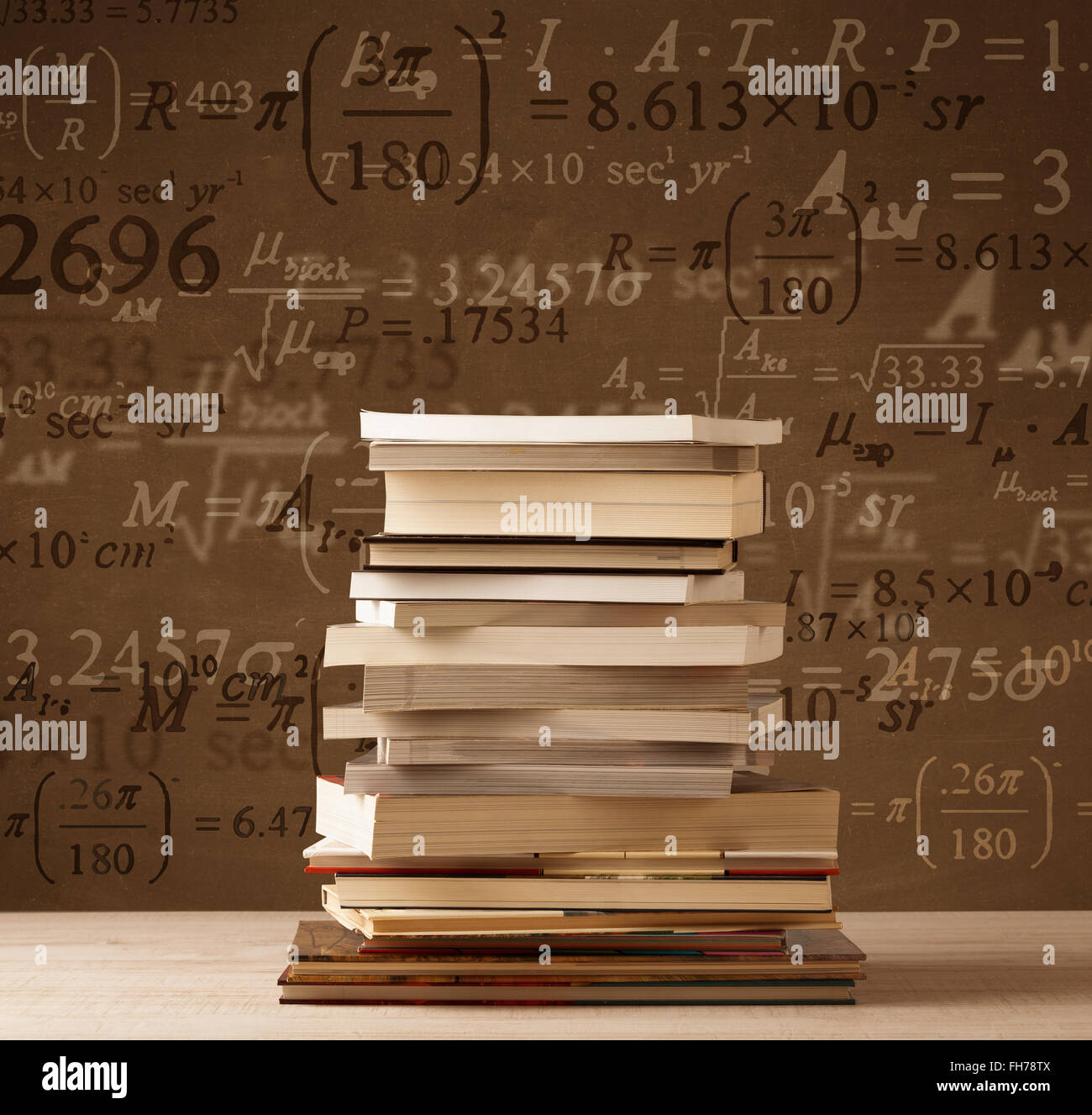 Books on vintage background with math formulas Stock Photo - Alamy