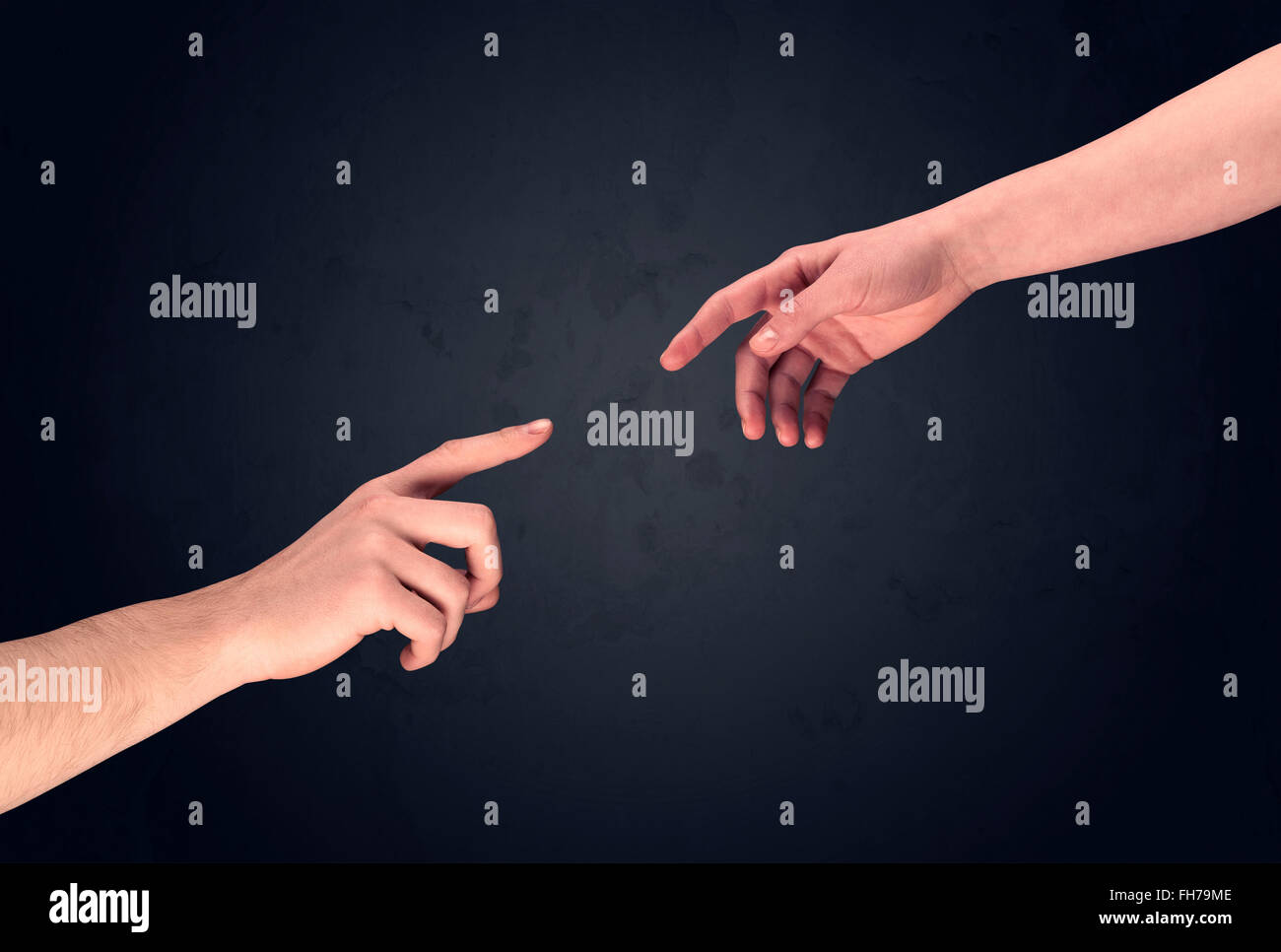 Hand about to touch another one Stock Photo - Alamy